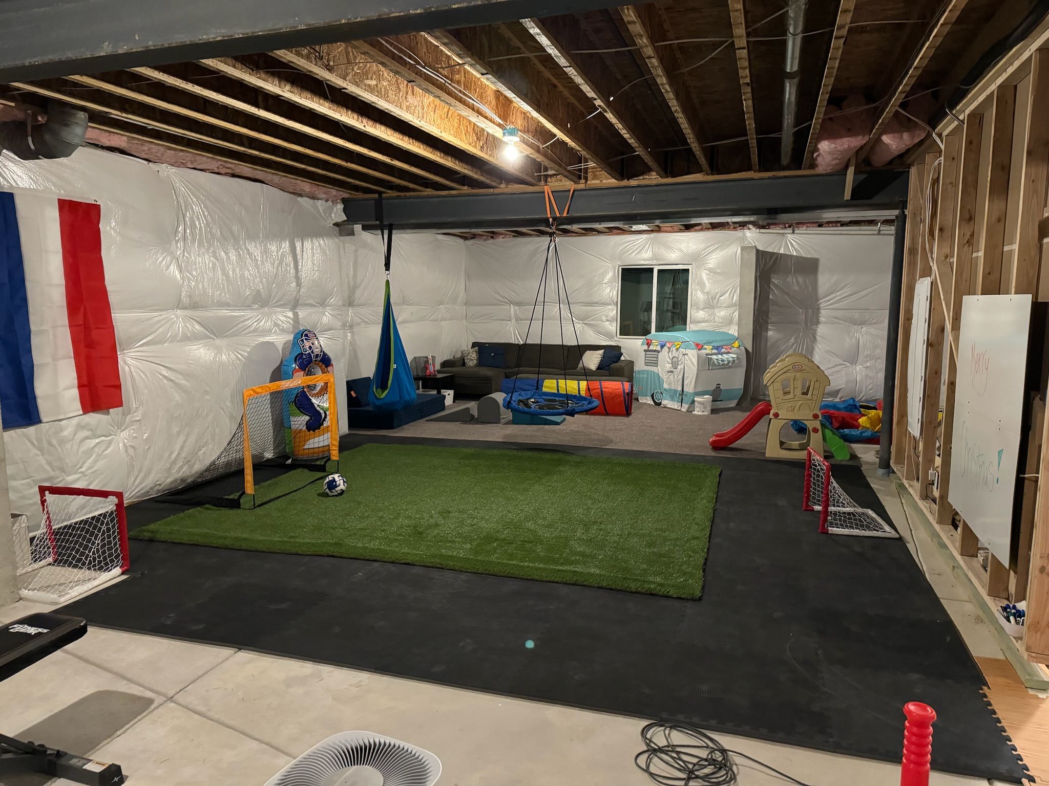 The best kid gift. An unfinished basement turned into kids dream space